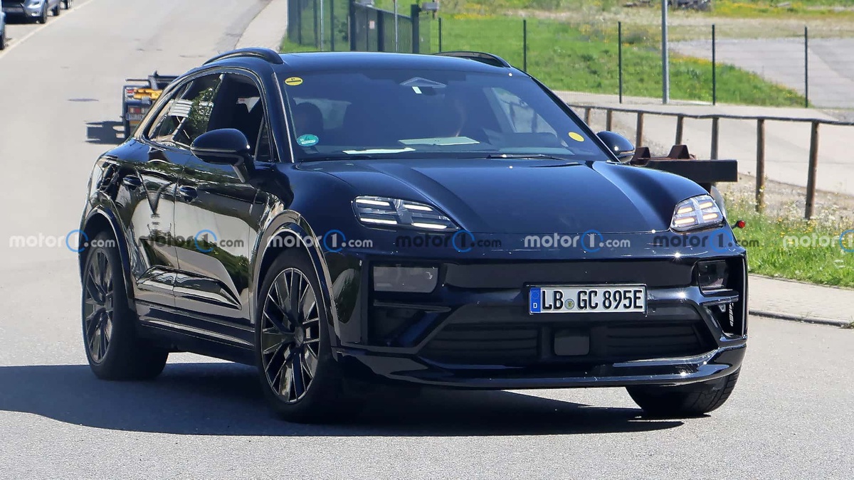 Porsche Macan EV captured with minimal camouflage in new photos ...